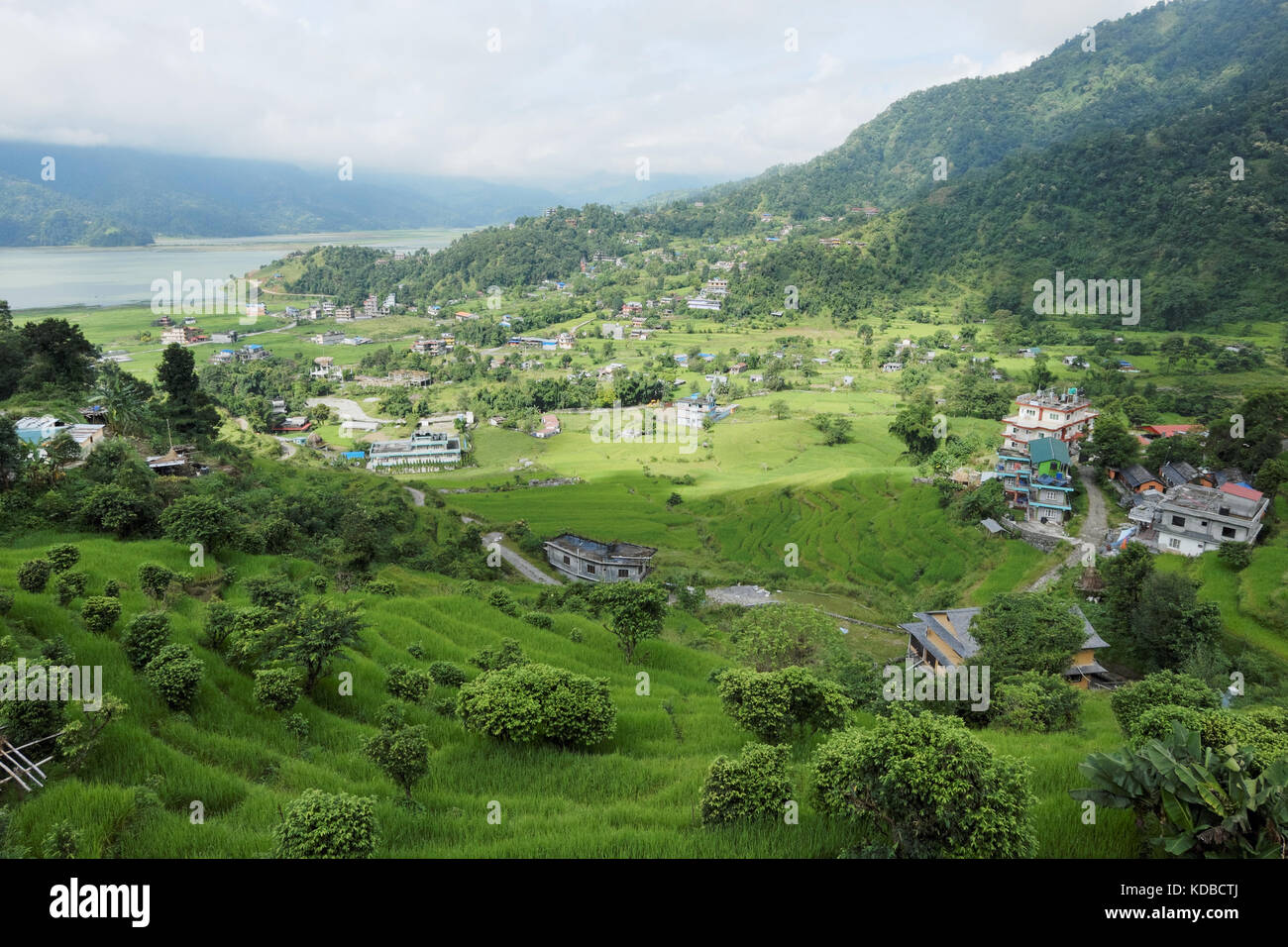 A small town in a very green valley Stock Photo - Alamy
