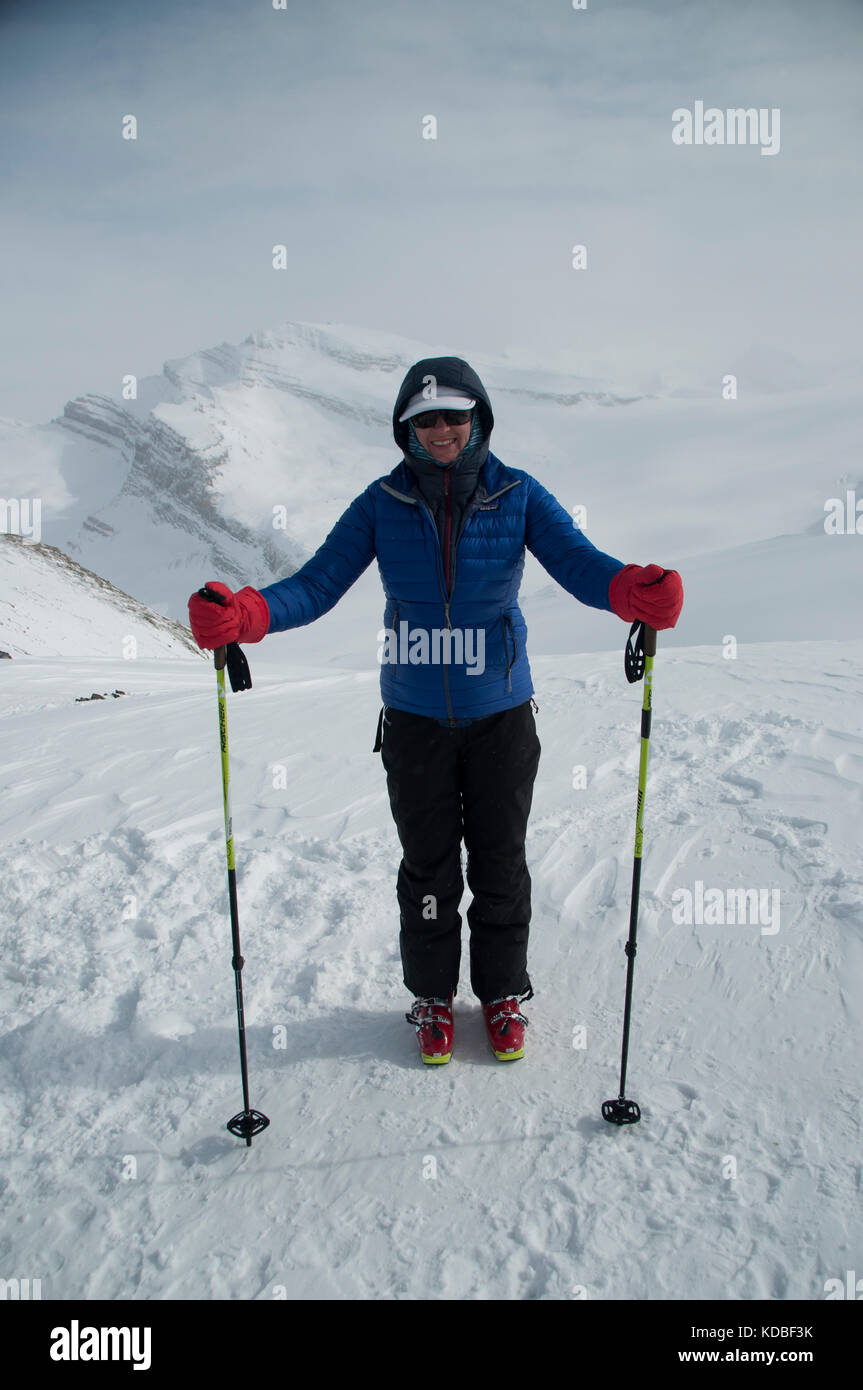 Female ski mountaineer at the Trapper-Baker Col on the British Columbia ...