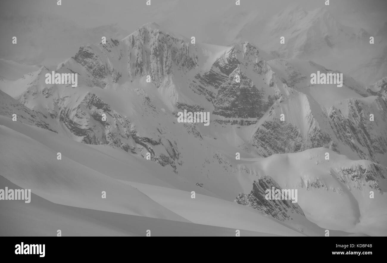 Mountain weather moves in around the peaks of the Blaeberry River ...