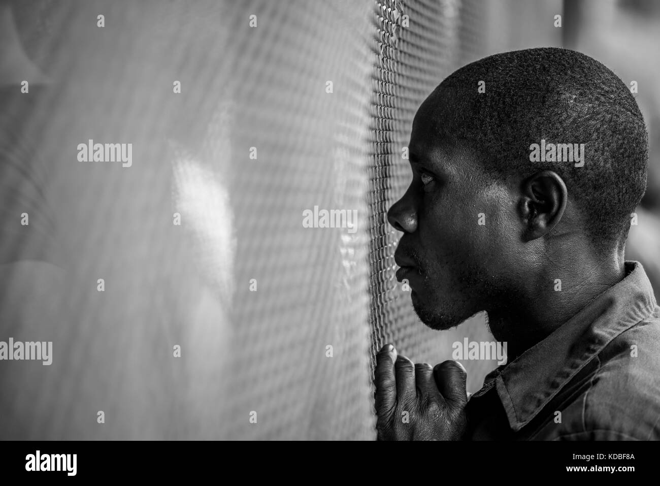 Man eyes through Black and White Stock Photos & Images - Alamy