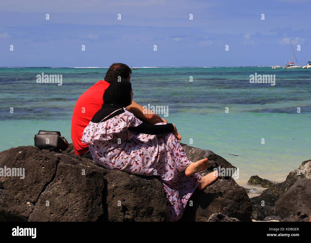 Ile aux Cerfs, Mauritius - unidentified Muslim couple relax on the ...