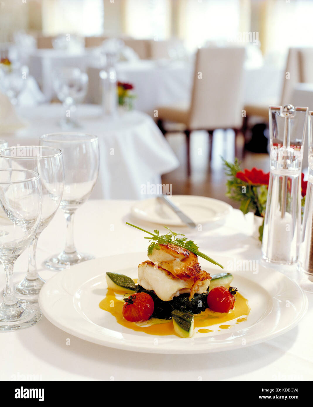 Still life. Food. Restaurant table setting. Roasted Cod Stock Photo - Alamy