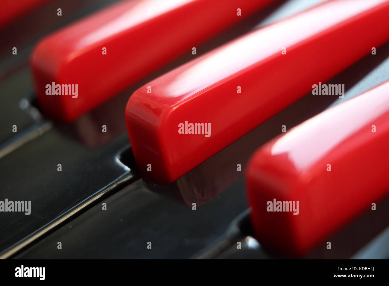Closeup of black and red keys of plastic melodica keyboard Stock Photo ...