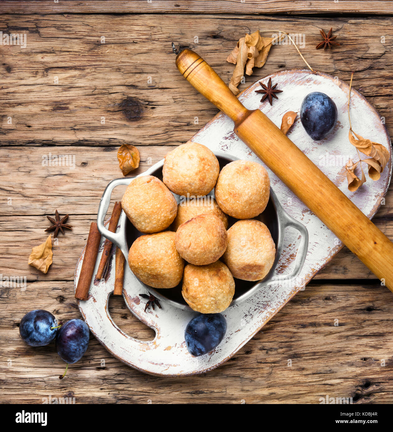 pies with autumn plum inside in a rural style Stock Photo - Alamy