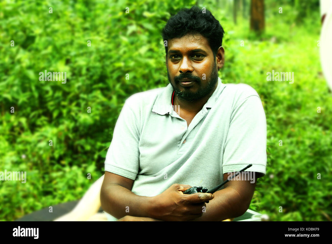 Portrait of man with waki toki nature background Stock Photo - Alamy