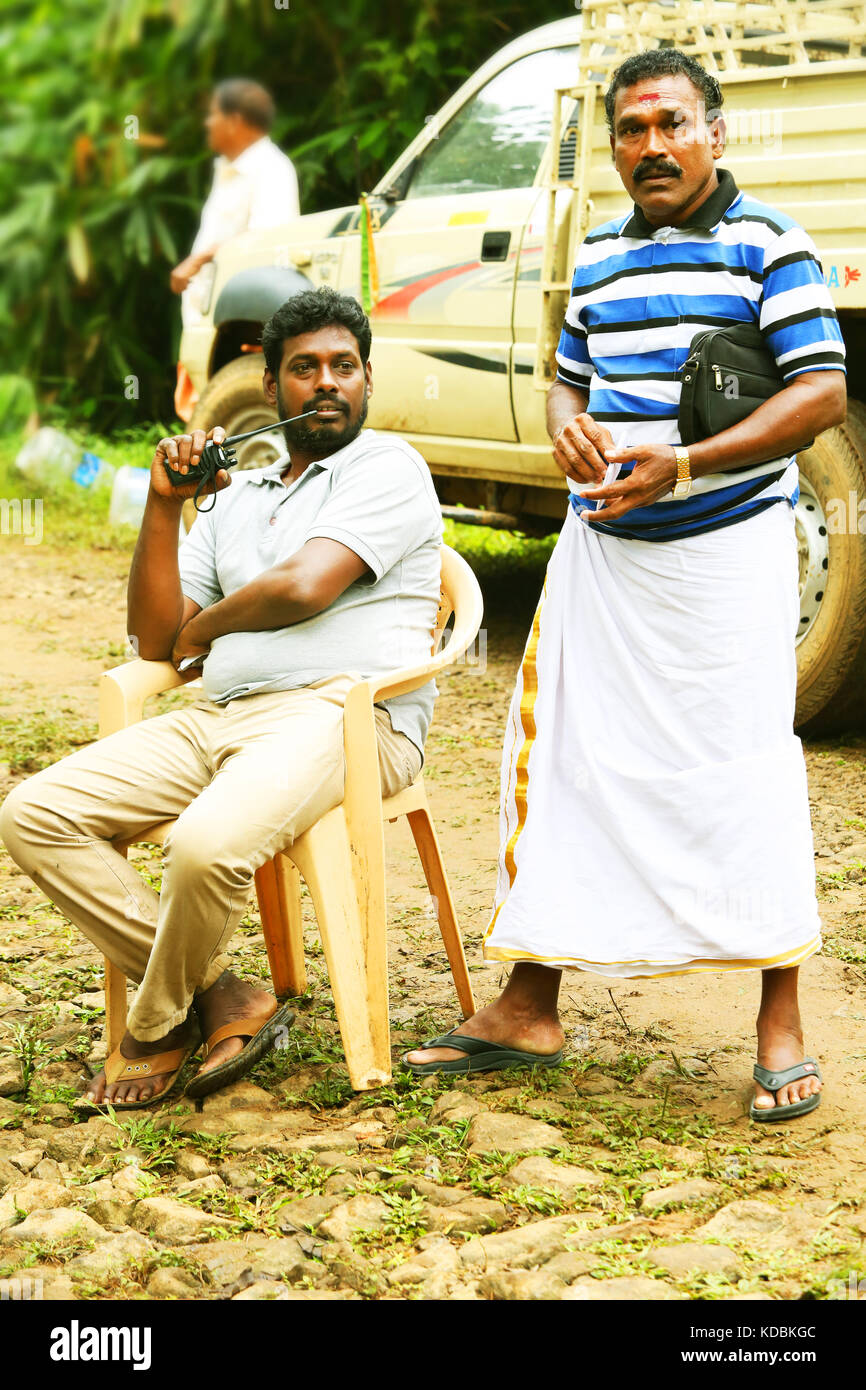 Portrait of two man looking at camera with woki toki Stock Photo - Alamy