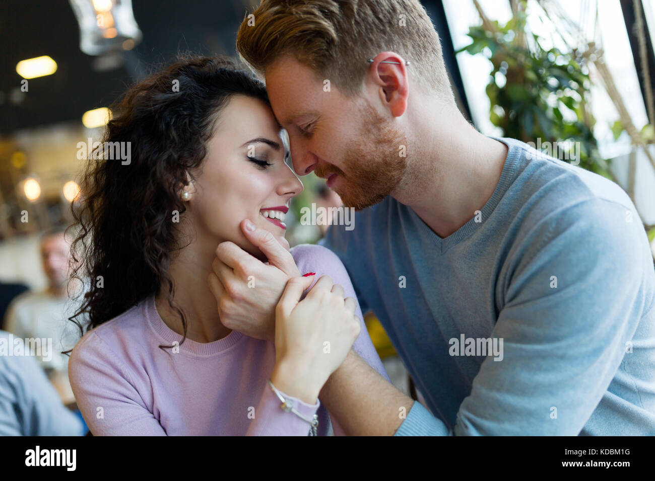 Loving young couple hugging hi-res stock photography and images - Alamy