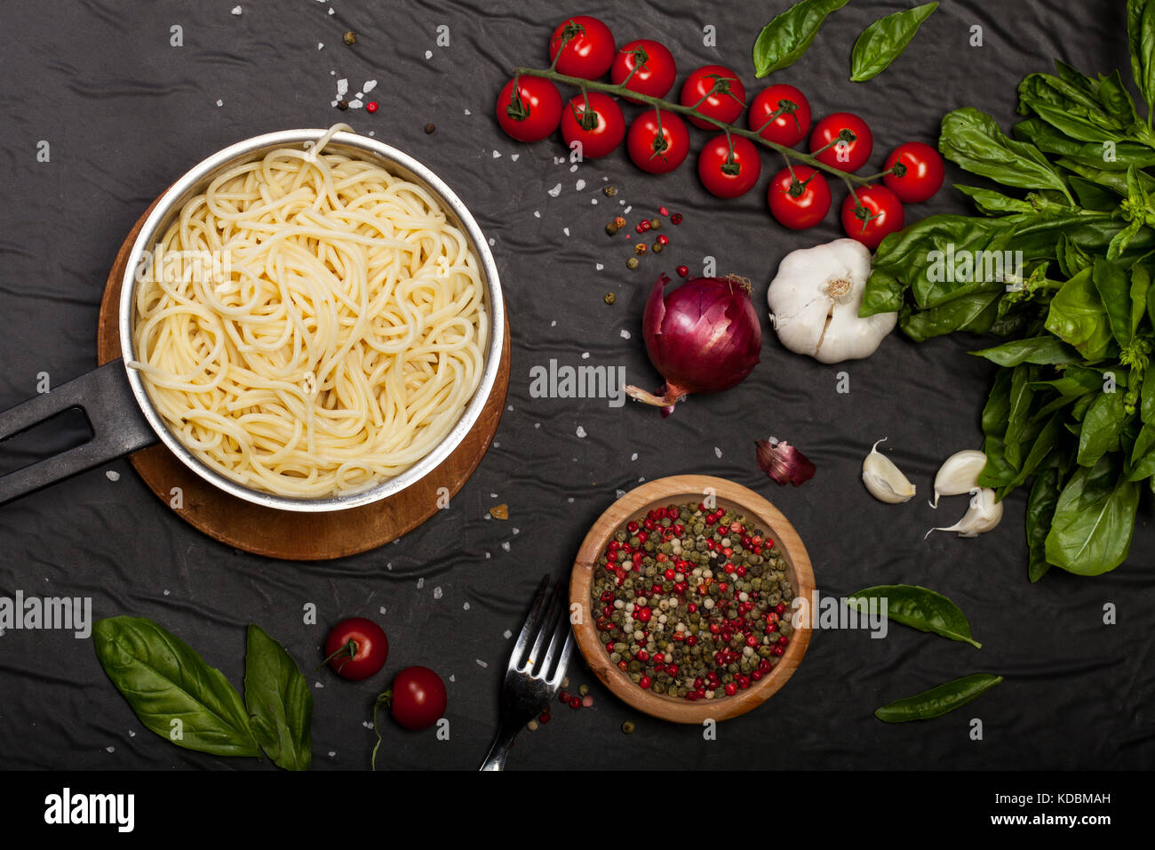 Closeup of delicious spaghetti in a pan. Top view Stock Photo - Alamy