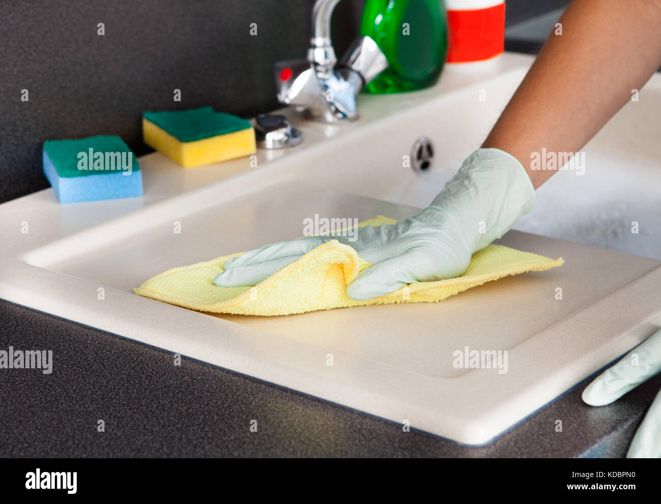 Portrait Of Happy Woman Cleaning Kitchen Worktop Stock Photo - Alamy