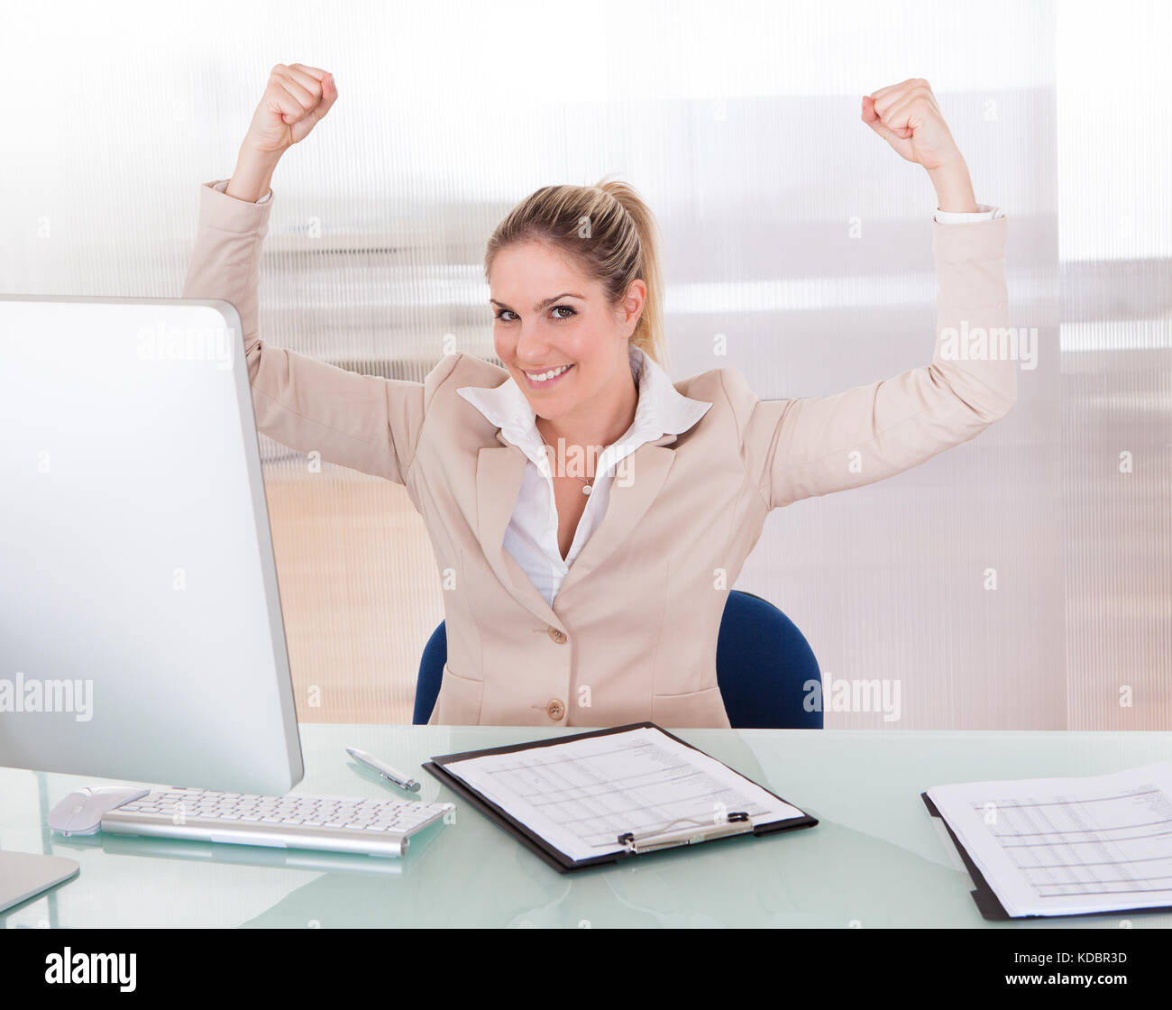 Young woman raising hand in hi-res stock photography and images - Alamy