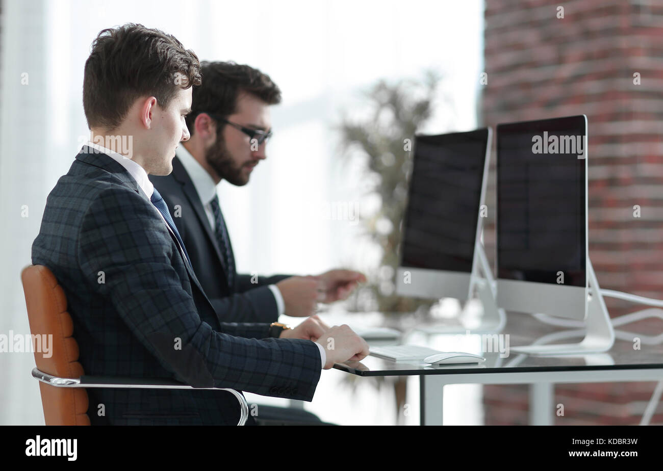 employees work with computers in a modern office Stock Photo - Alamy
