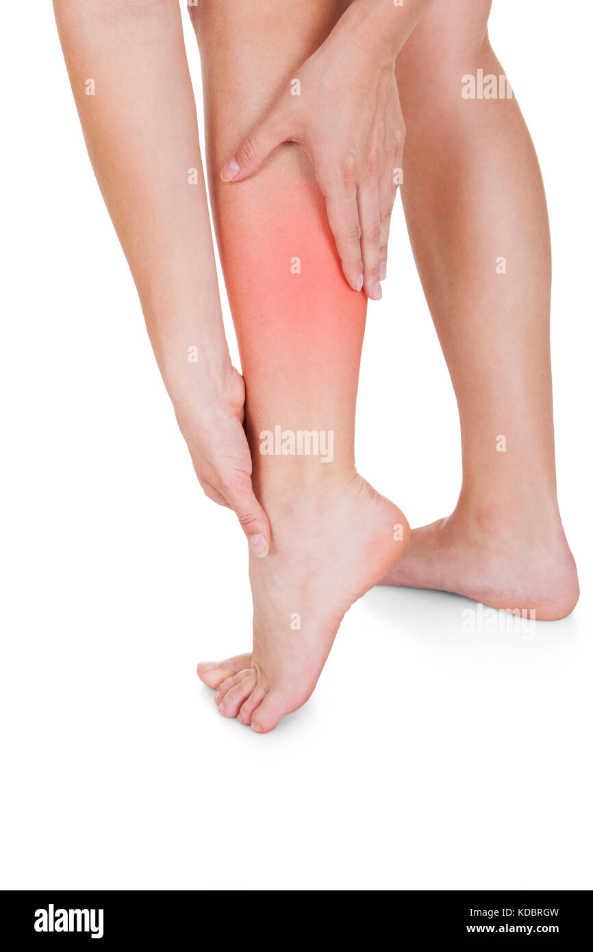Close up of woman's ankle isolated on white background Stock Photo - Alamy