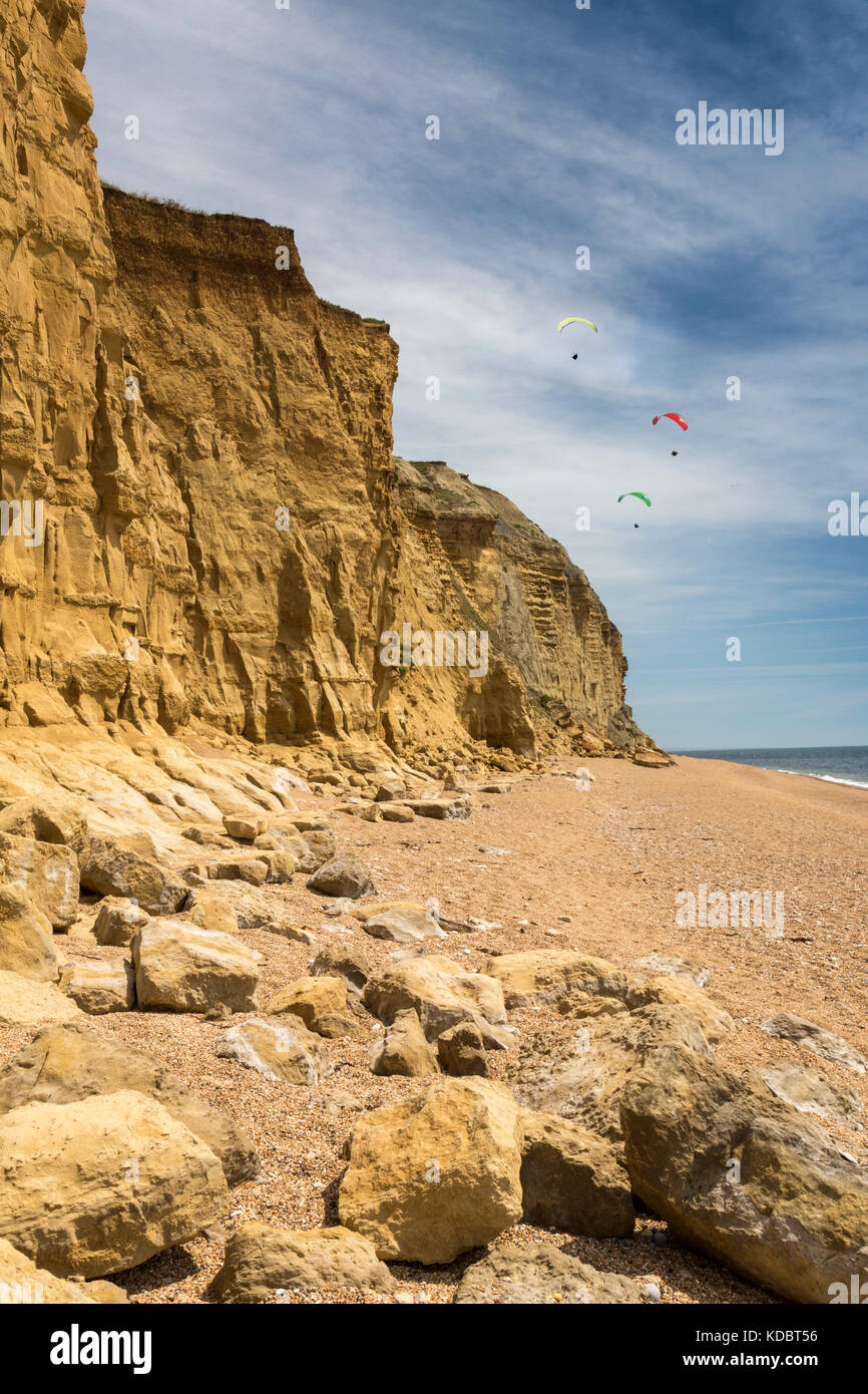 Huge lumps of sandstone have fallen onto the beach below the unstable ...