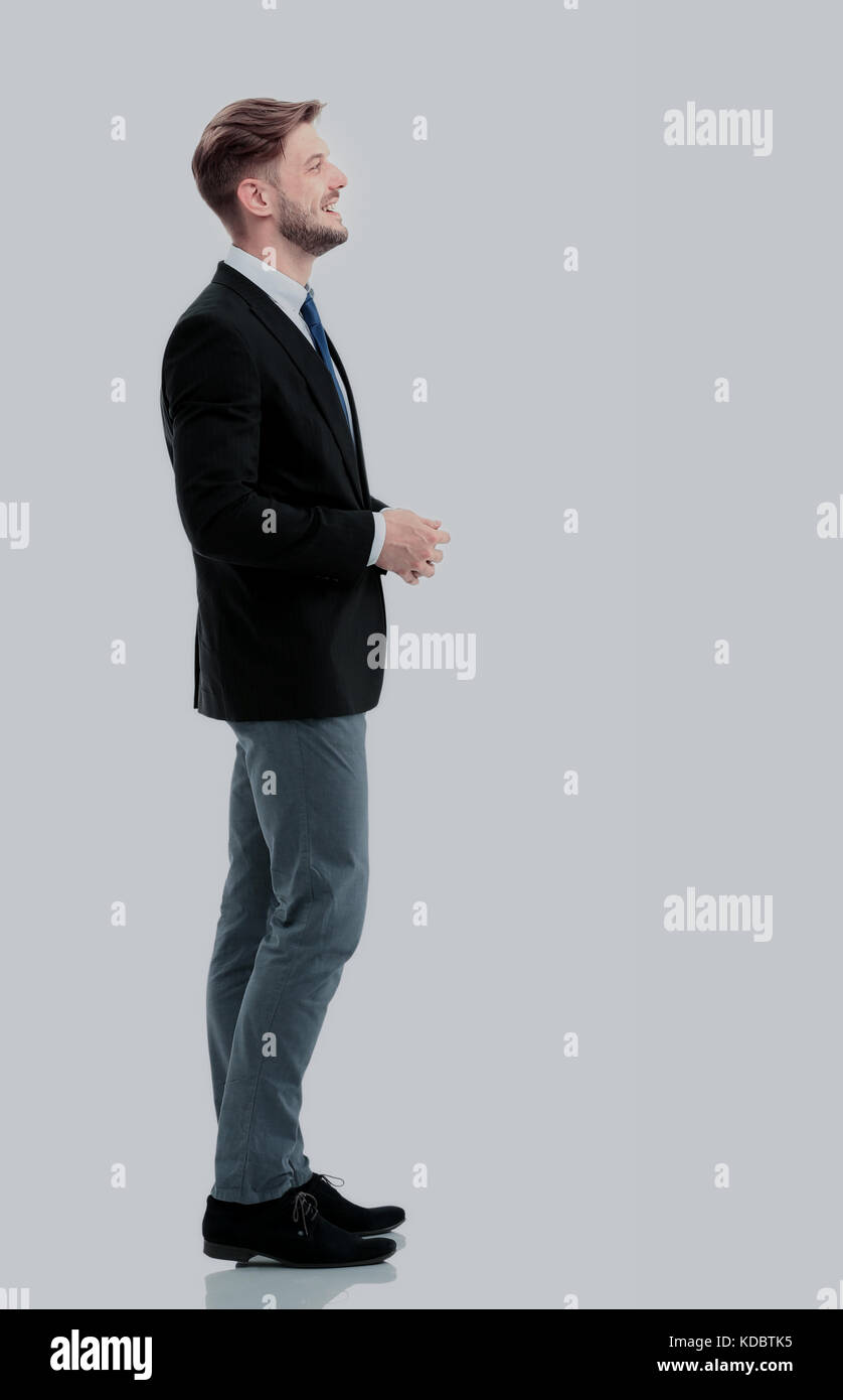 Side view of a smiling businessman standing , On white backgroun Stock ...