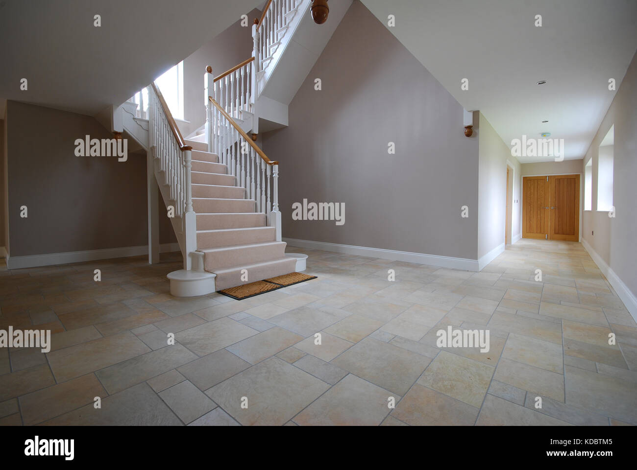 large elegant hallway in new build executive house Stock Photo - Alamy