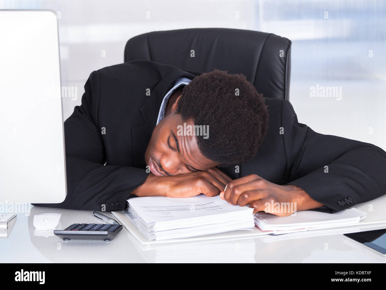 Portrait Of Stressed Businessman Sleeping In Office Stock Photo - Alamy