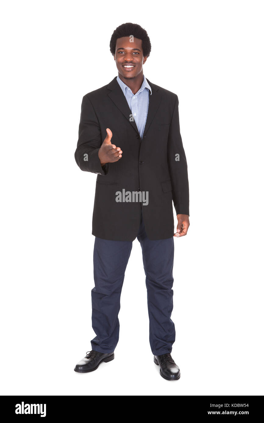 African business man offering handshake hi-res stock photography and ...