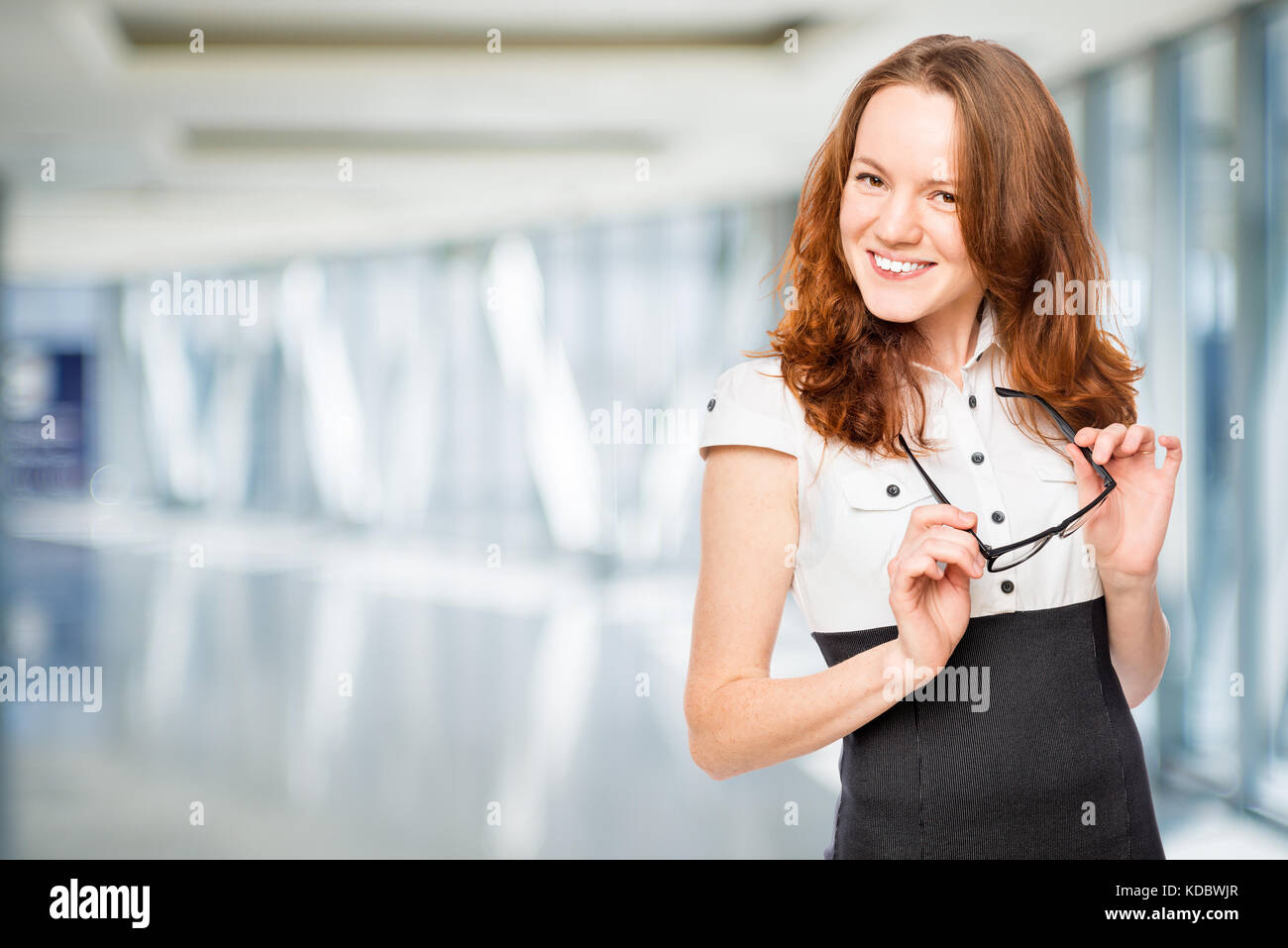 Portrait of a young secretary with glasses in the office Stock Photo ...