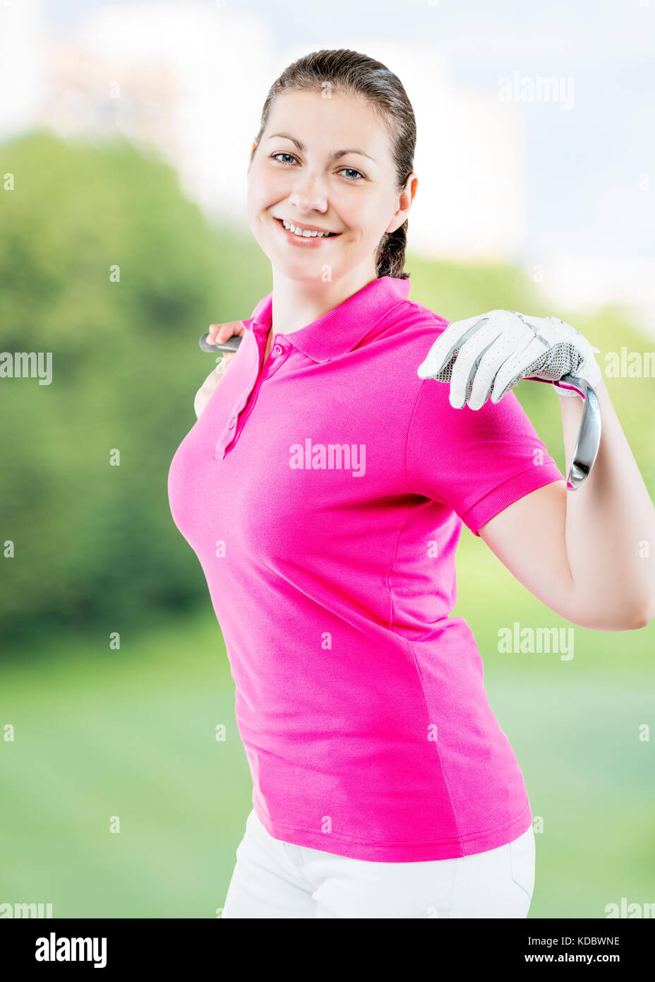 relaxed smiling woman golfer on a background of golf courses Stock ...