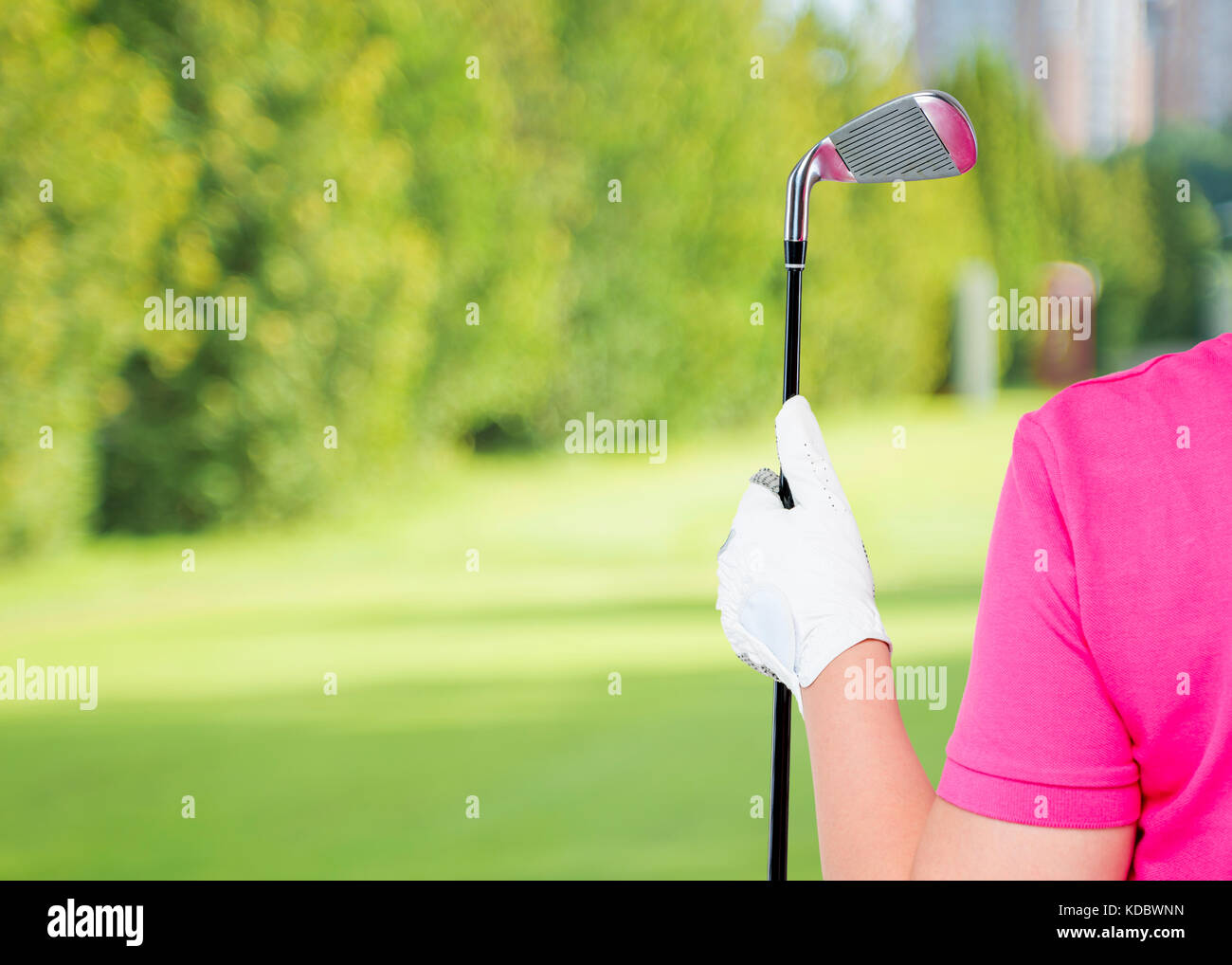 horizontal Photo gloved hand with a golf club and a space on the left ...