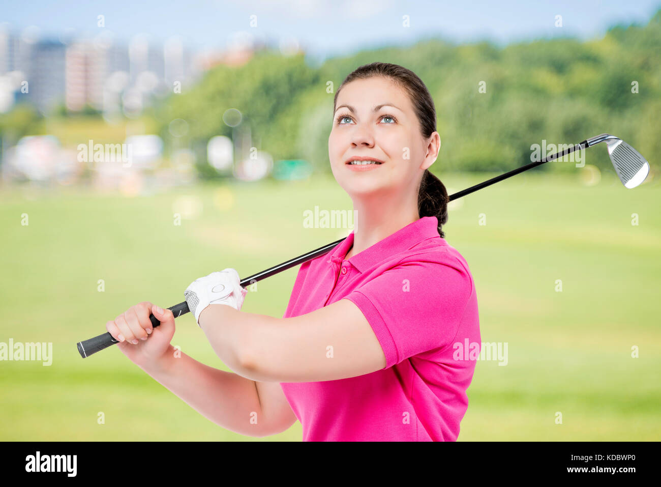 Horizontal portrait of a successful golfer with equipment for playing ...