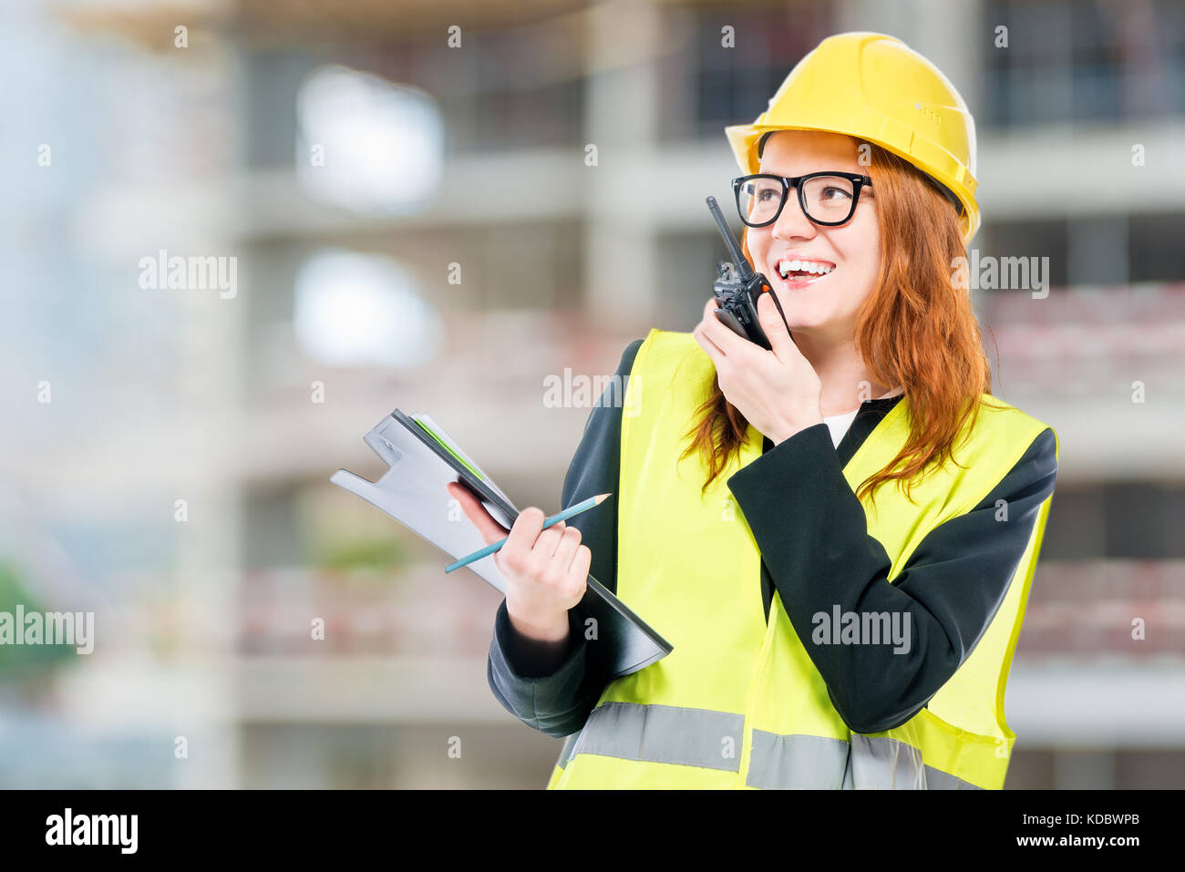 Professional foreman with radio at the construction site Stock Photo ...