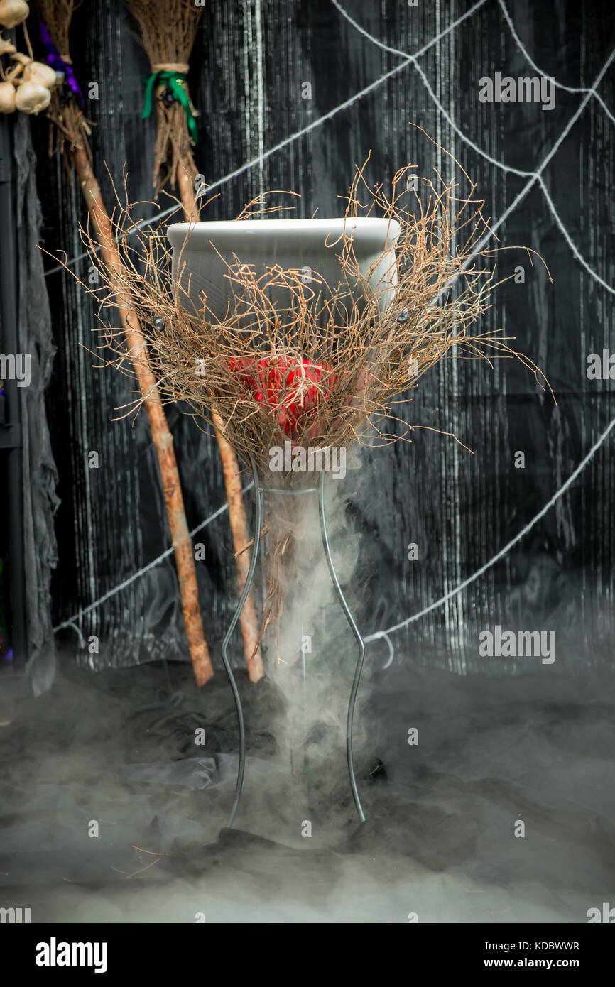 a pot of boiling potion on a dark background, no people Stock Photo - Alamy