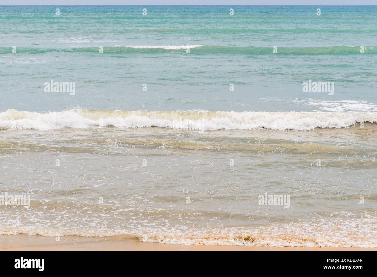 horizontal seascape waves on a sandy beach Stock Photo - Alamy