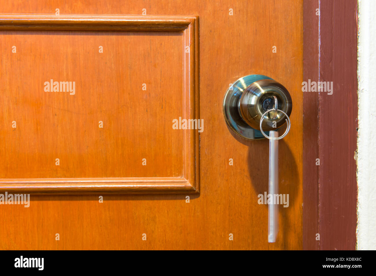 close-up of a door handle with a key entrance to the room Stock Photo ...
