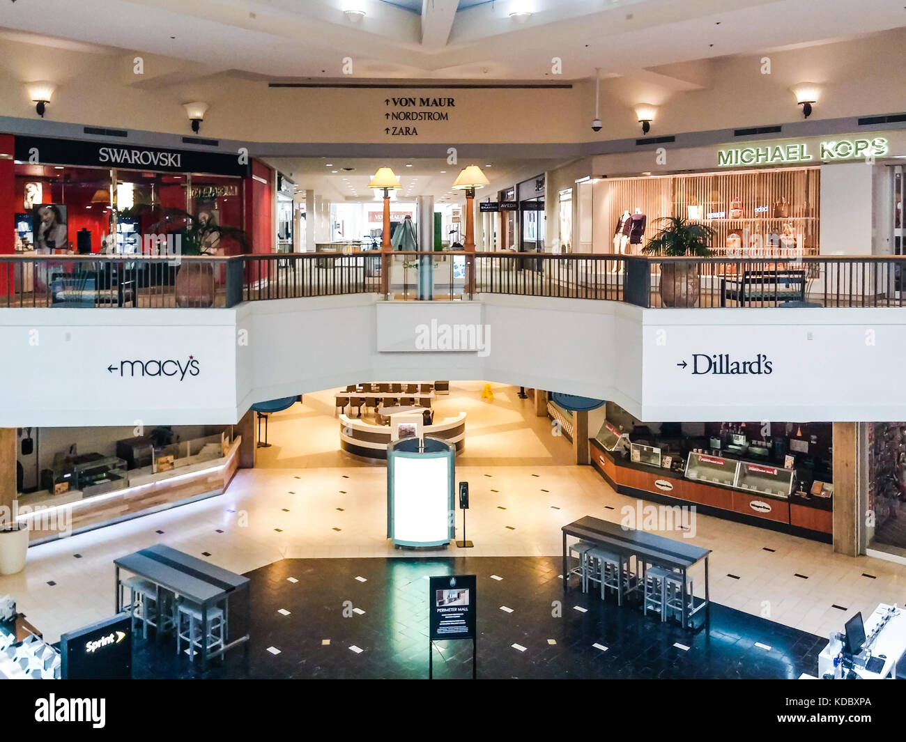 Signs and stores in a modern mall Stock Photo - Alamy