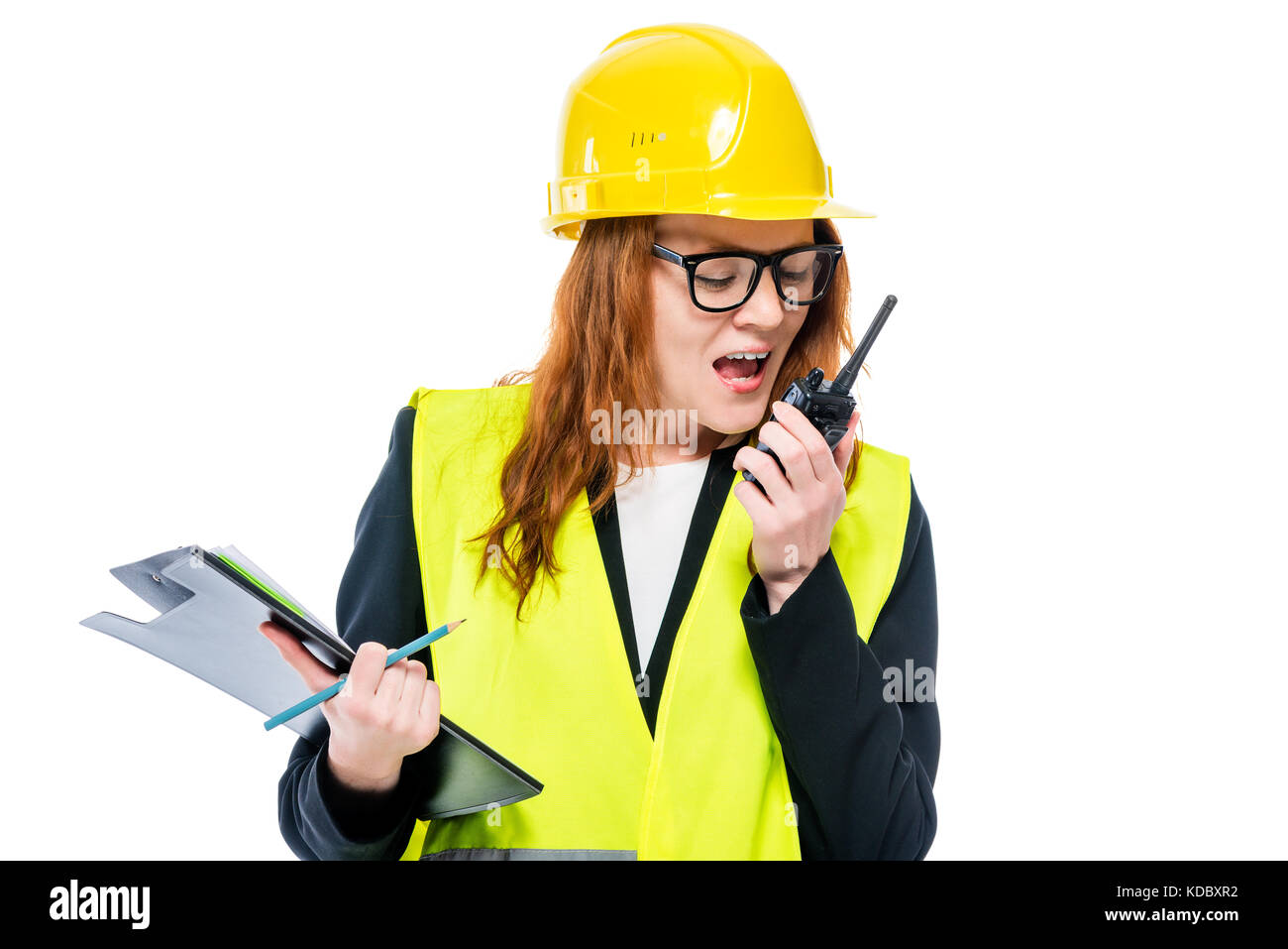 woman foreman with radio and folder on white background Stock Photo - Alamy