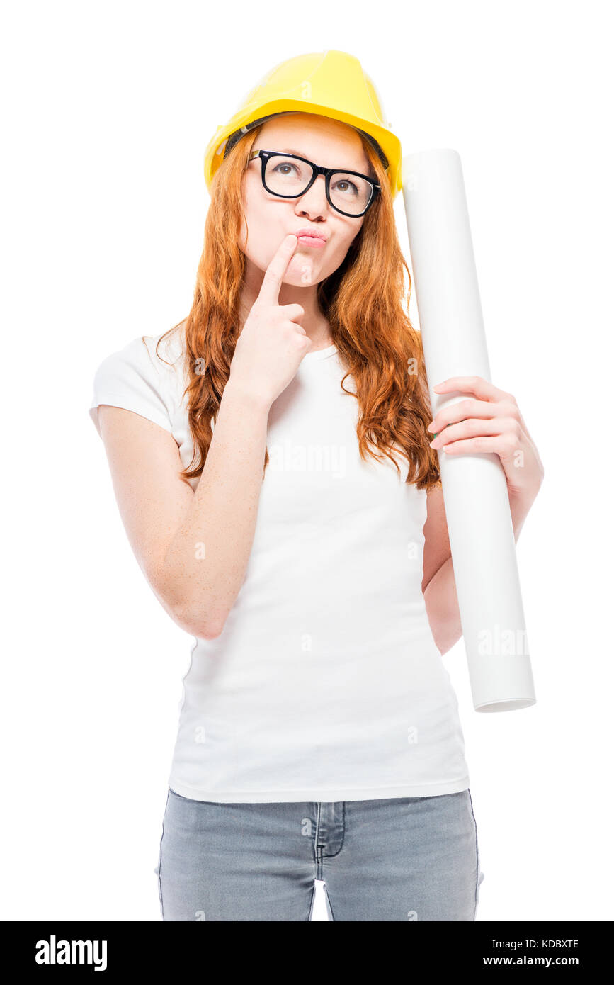 Pensive woman with blueprints in a yellow helmet isolated Stock Photo ...