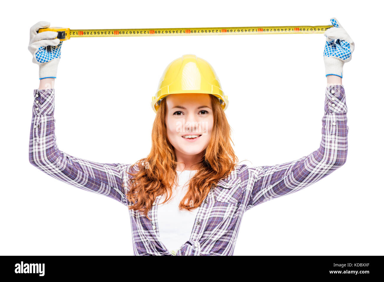 happy beautiful woman builder with tape measure on white background ...