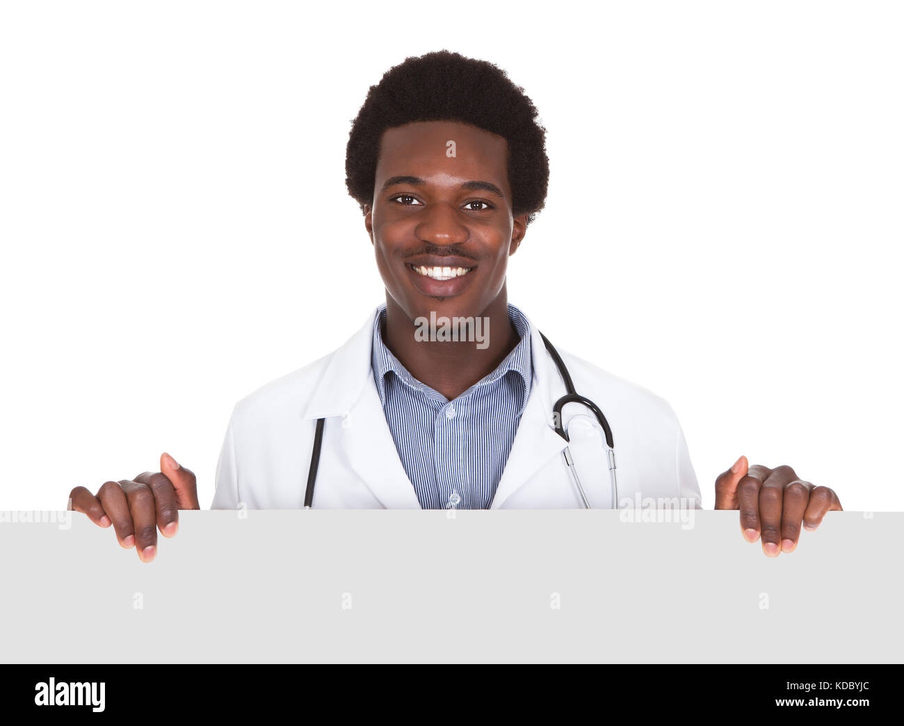 Portrait Of A Happy African Male Doctor Standing Behind Placard On ...