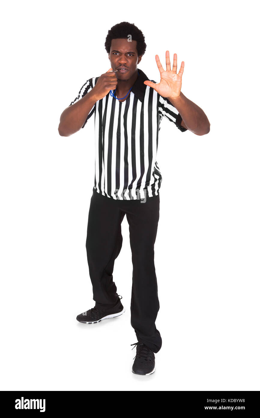 Portrait Of An African Referee Gesturing Over White Background Stock ...