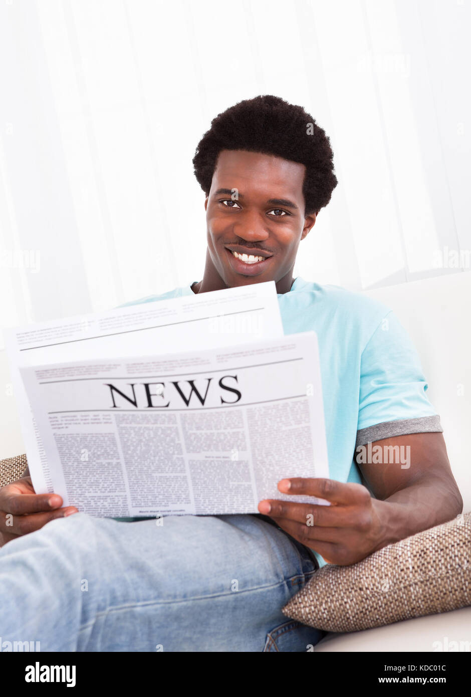 Black Man Reading Newspaper