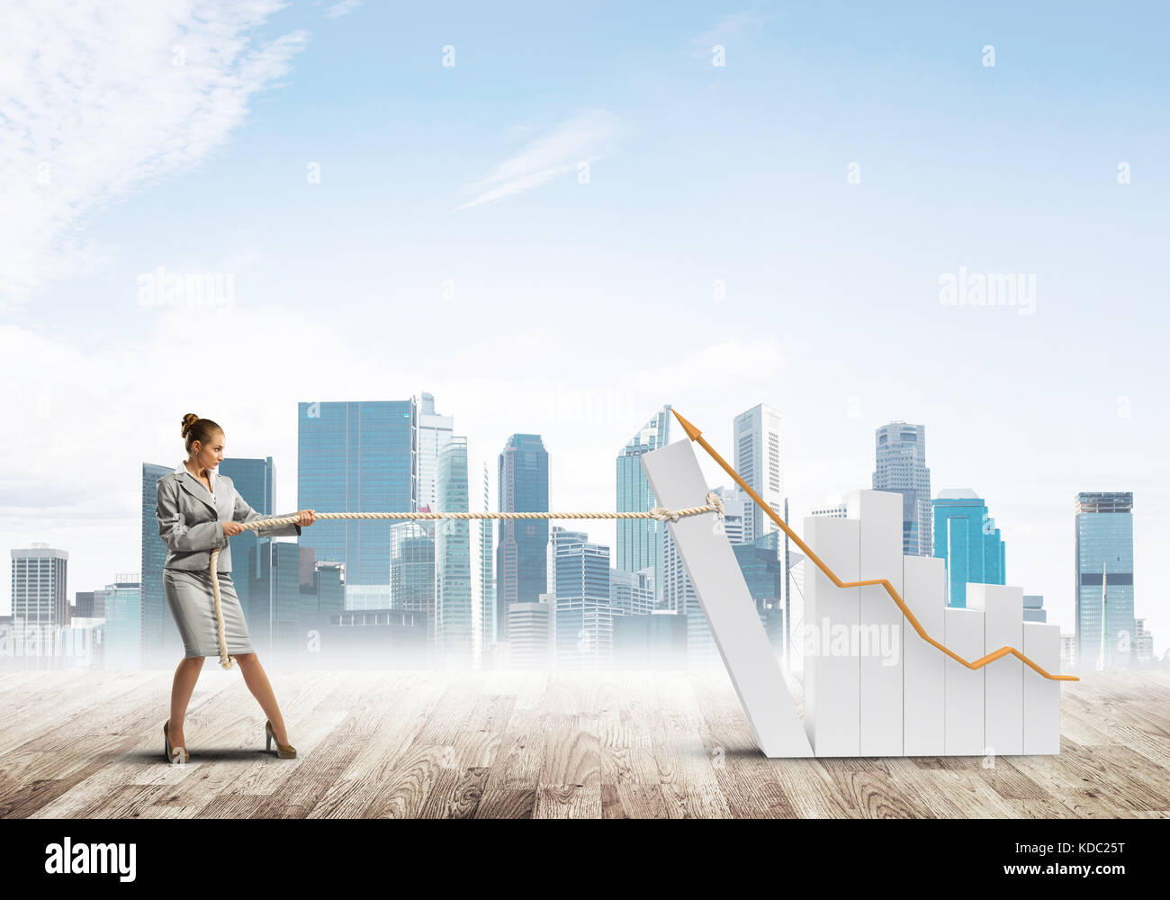 Businesswoman pulling graph with rope as concept of power and control ...