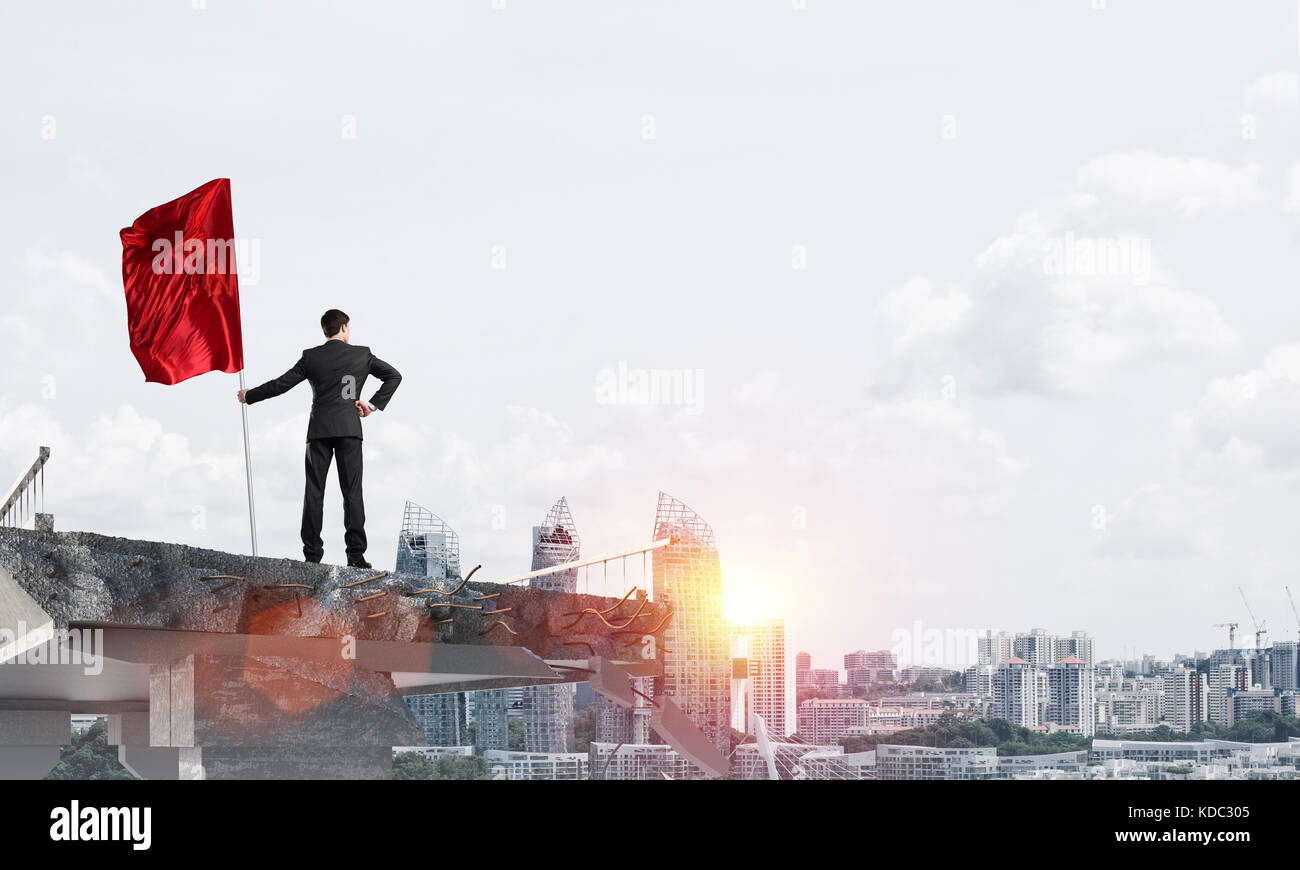 Man with flag presenting leadership concept Stock Photo - Alamy
