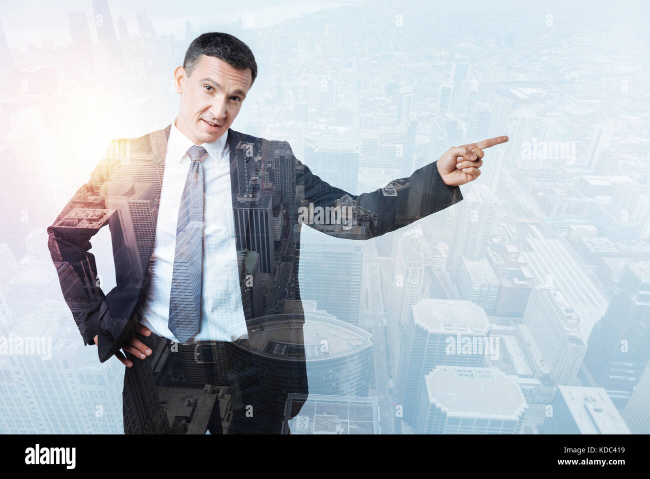 Relaxed man showing correct way Stock Photo - Alamy