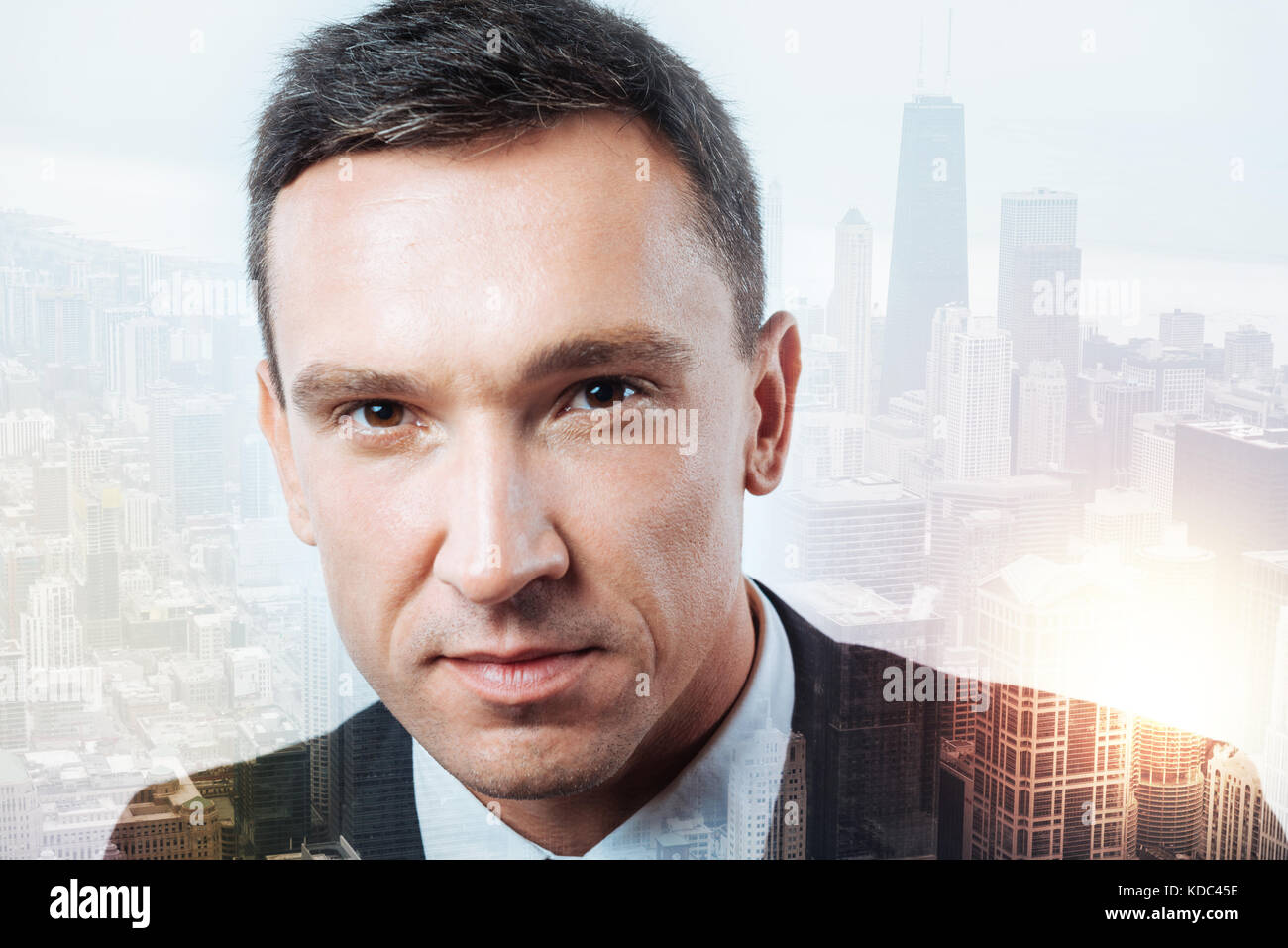 Close up of a calm serious man Stock Photo - Alamy