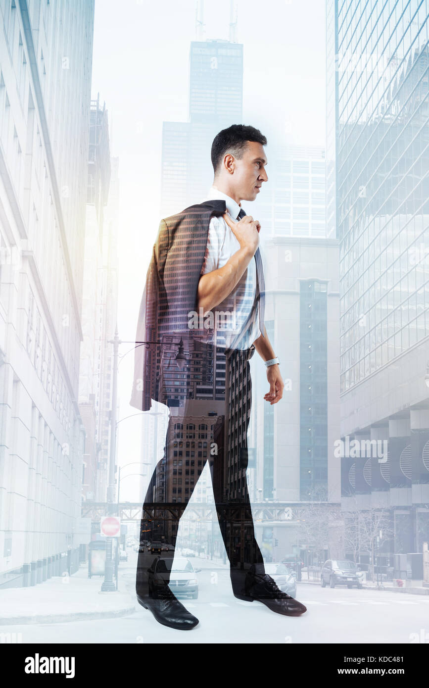 Serious man going in a certain direction Stock Photo - Alamy