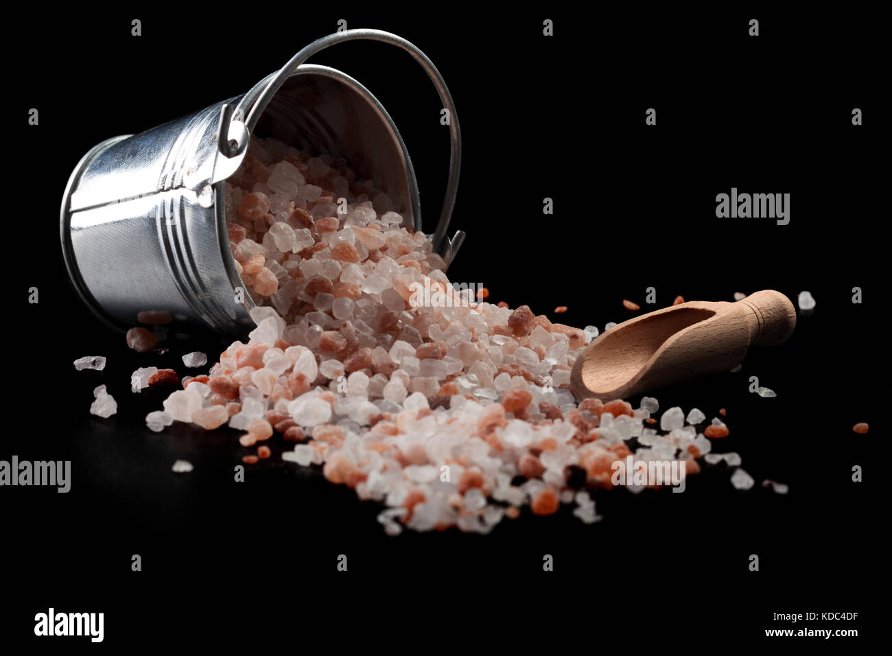 Himalayan Salt Pile Pouring of a Silver Metal Bucket With Wood Spice ...