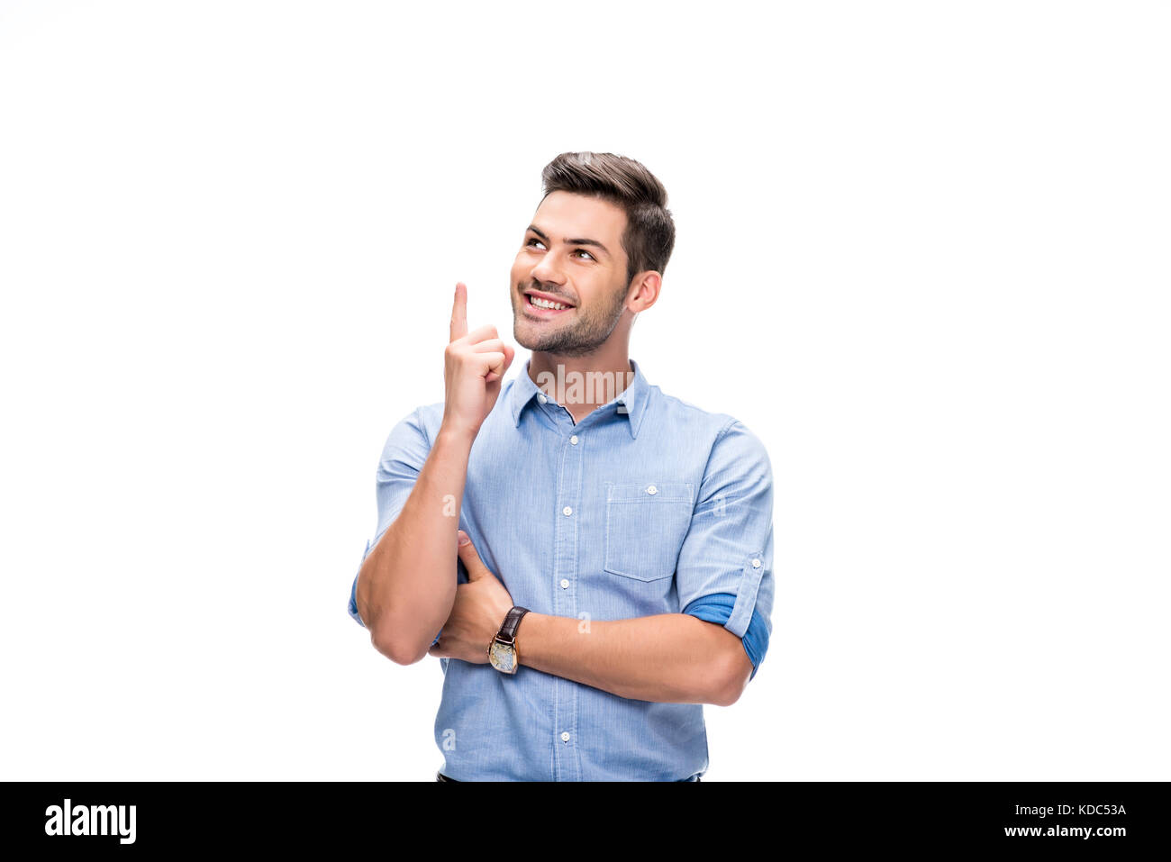 young man pointing up Stock Photo - Alamy