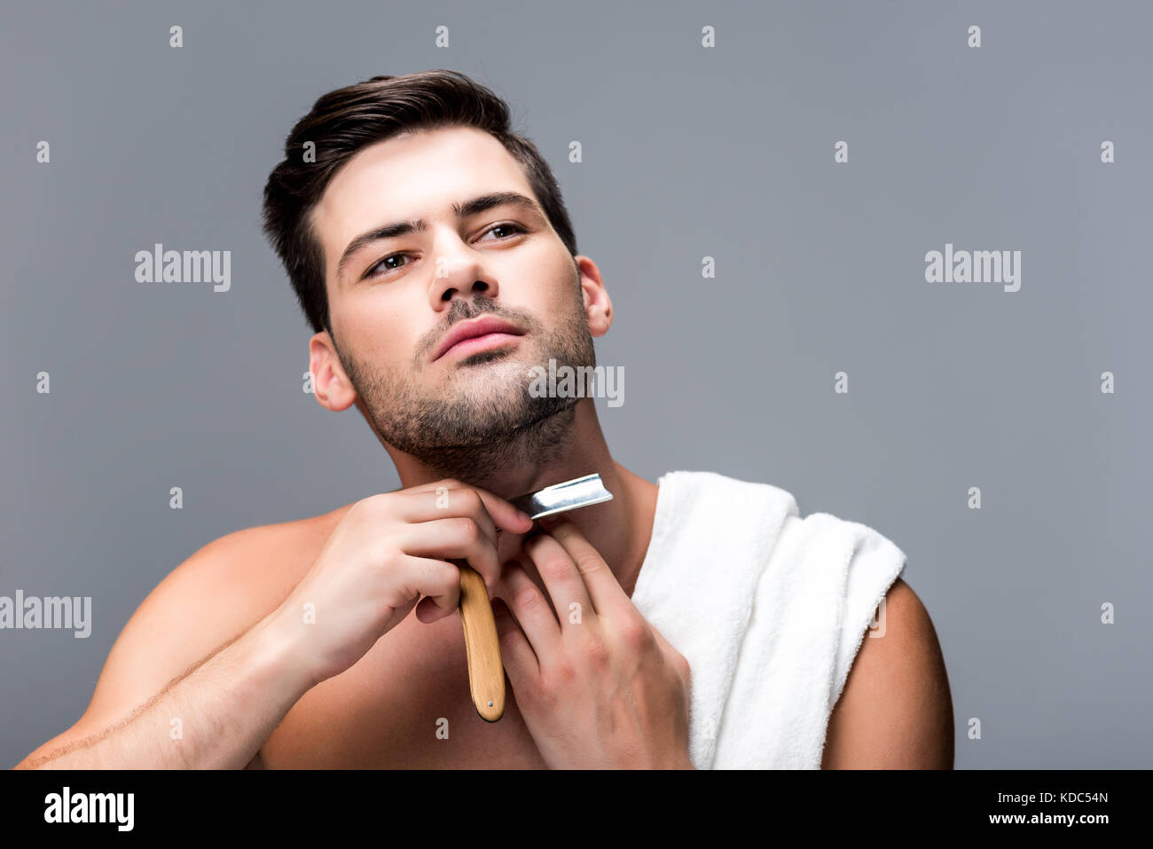 man shaving with straight razor Stock Photo - Alamy