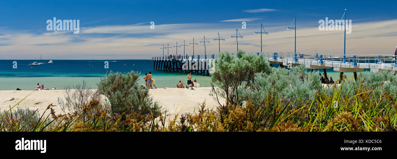 Families enjoying sandy beach on sunny day at Palm Beach Jetty ...
