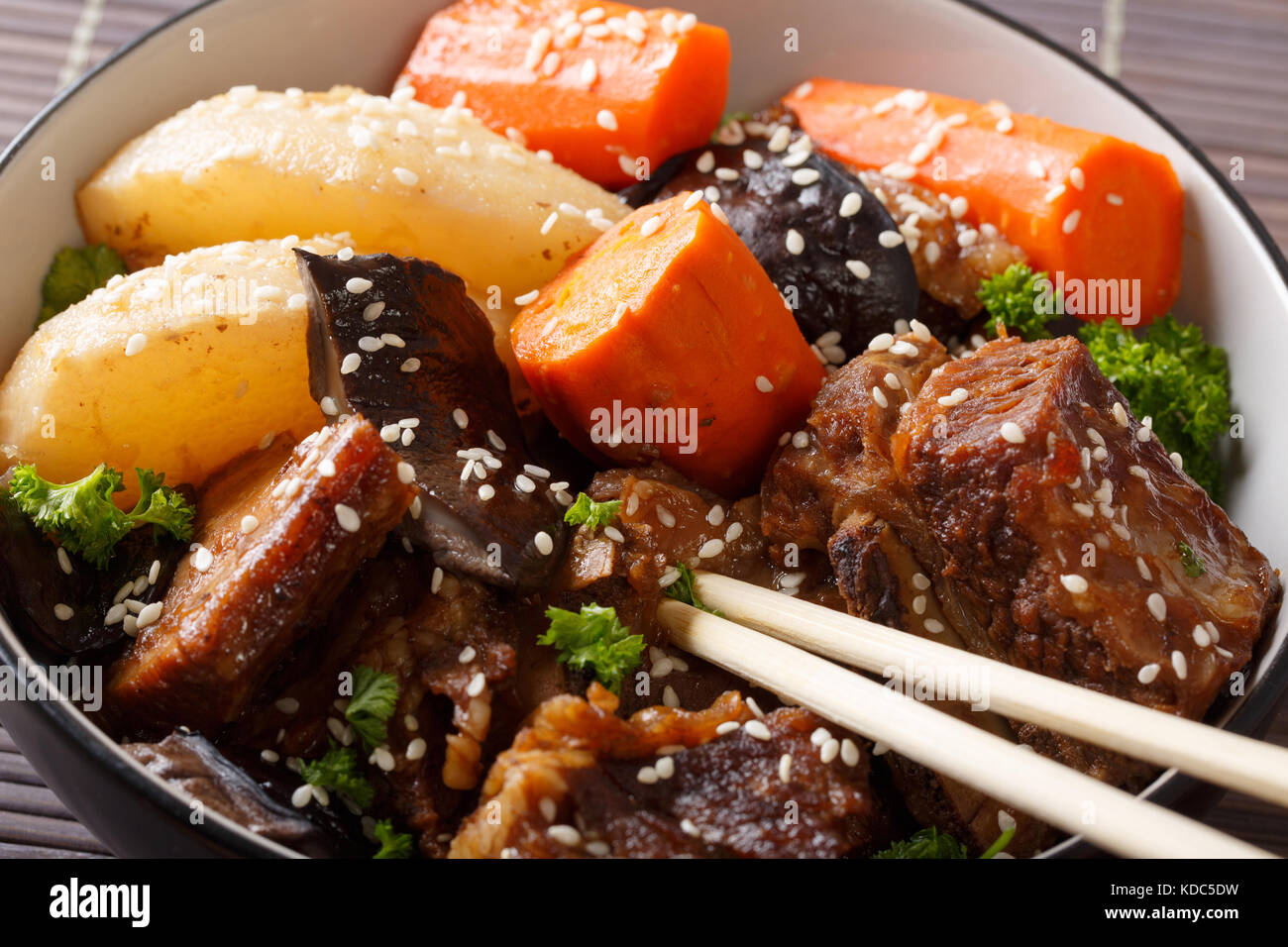 Kalbi Jim (Korean Braised Beef Short Ribs) closeup on a bowl ...
