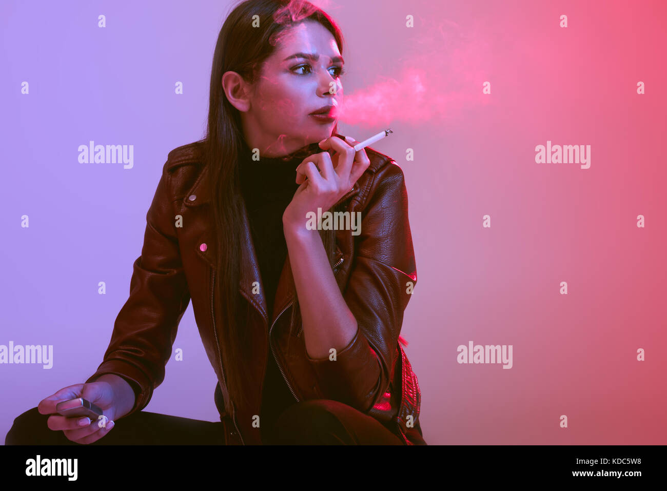Fashion model smoking cigarette hi-res stock photography and images - Alamy