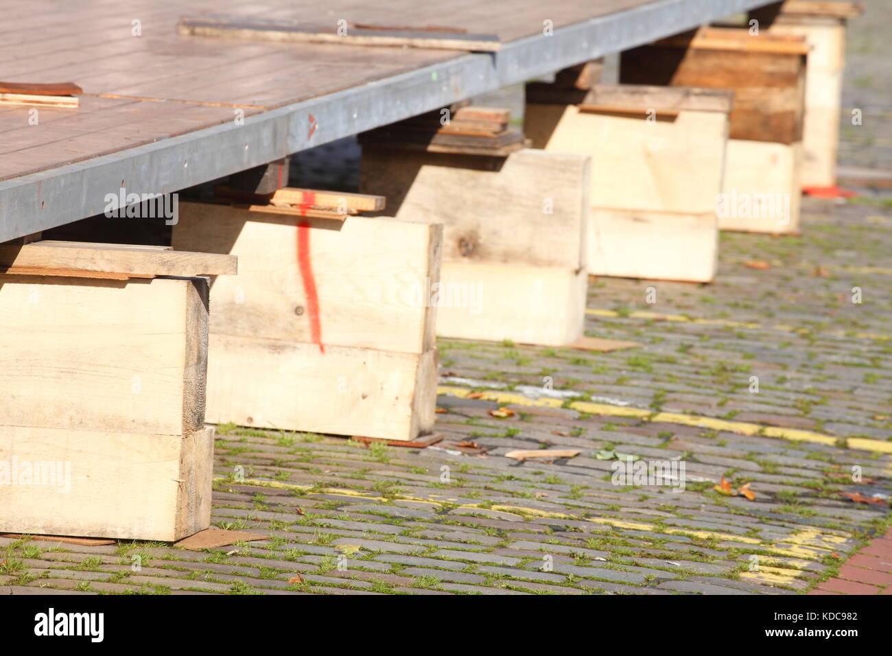 brown wooden logs as supporting elements Stock Photo - Alamy