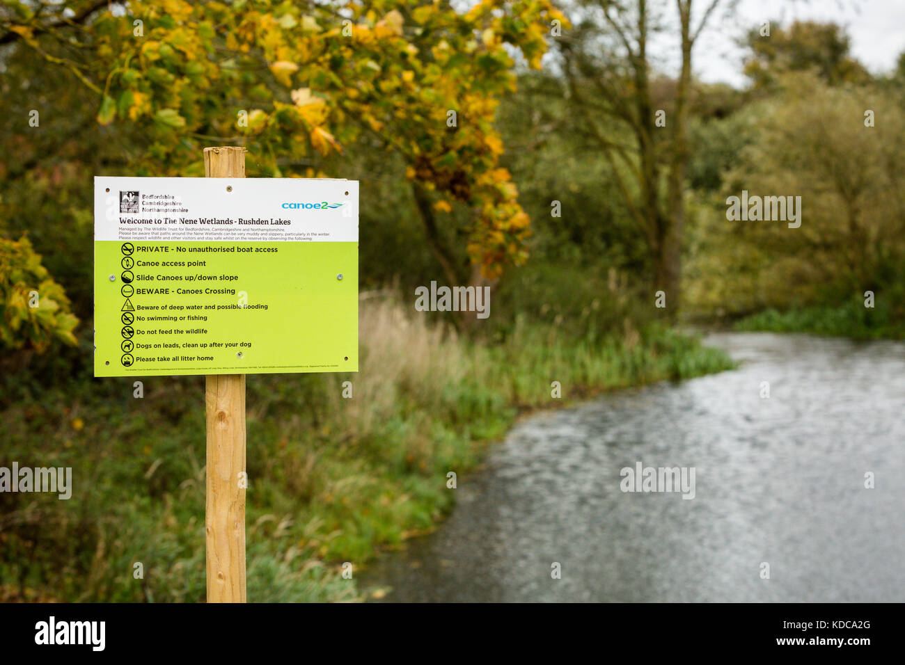 A sign indicating a landing place for canoes,also known as a portage ...