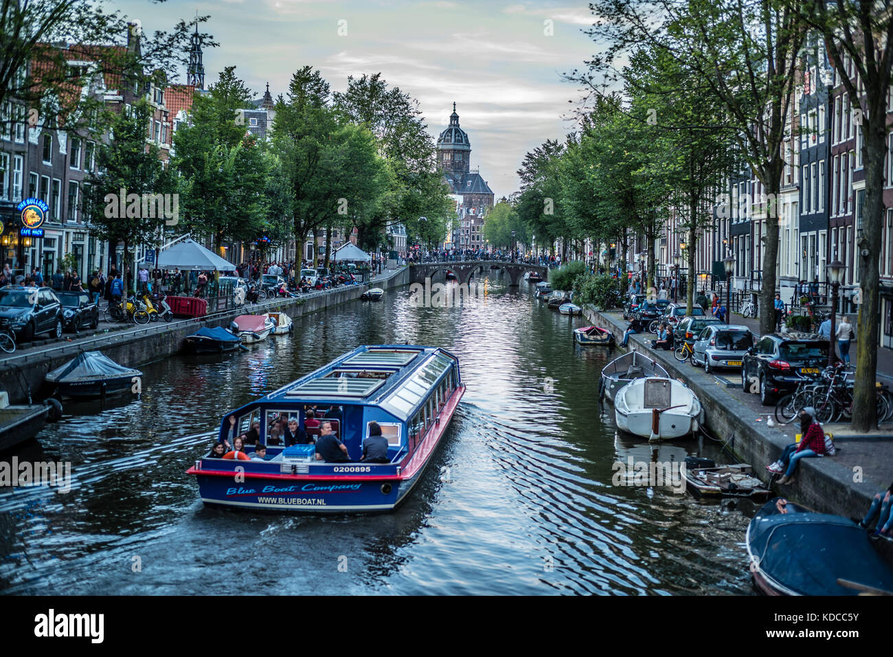 Amsterdam canal tour boat Stock Photo - Alamy